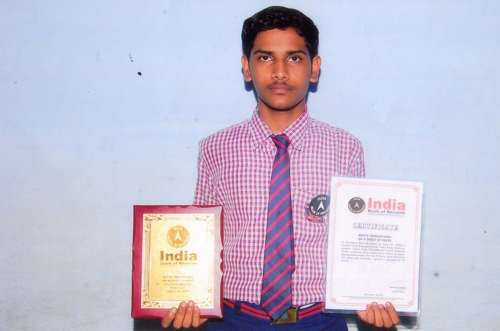 WROTE THIRUKKURAL ON A SHEET OF PAPER India Book Of Records