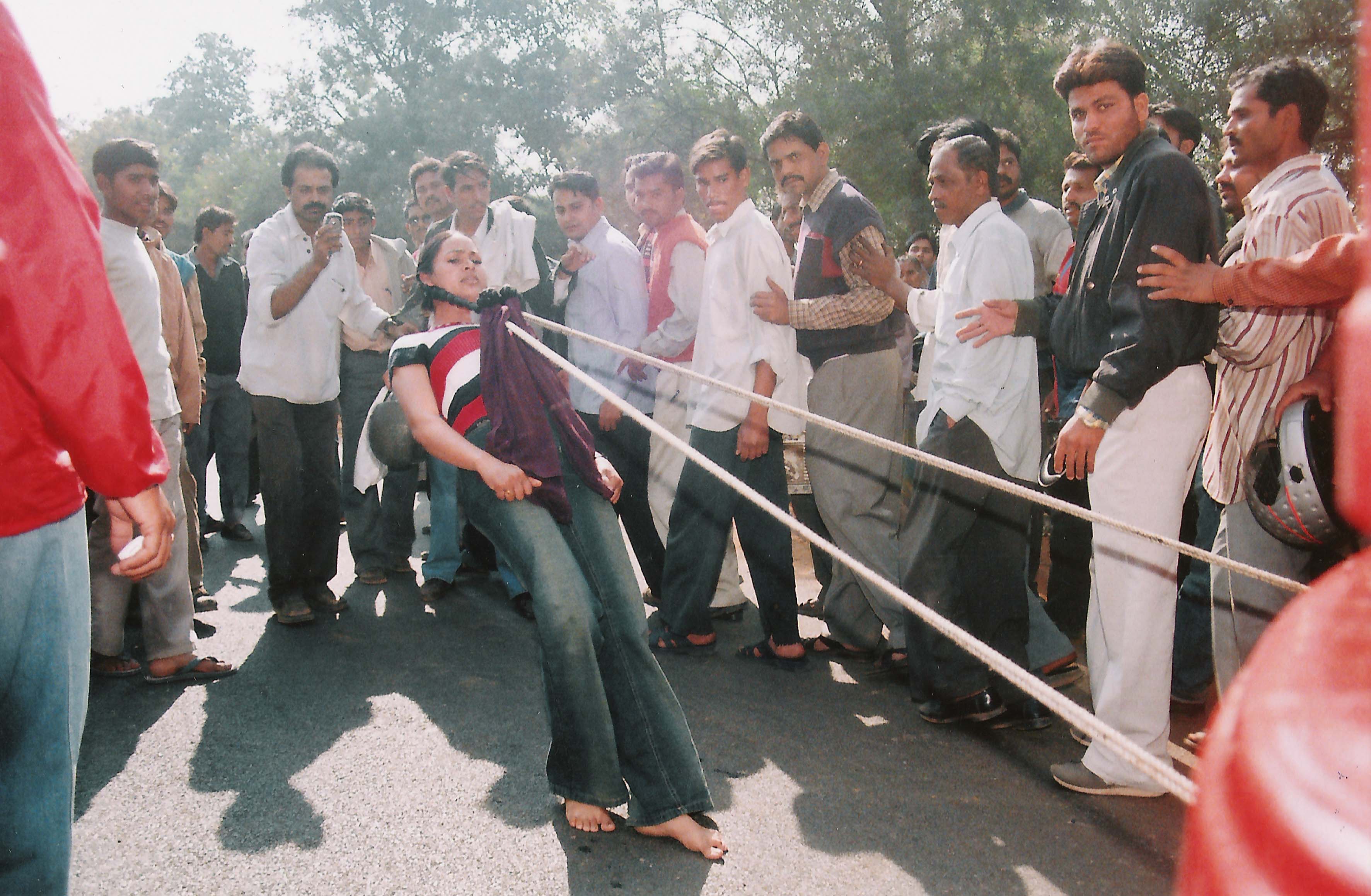 Pulling Truck By Hair. - India Book of Records