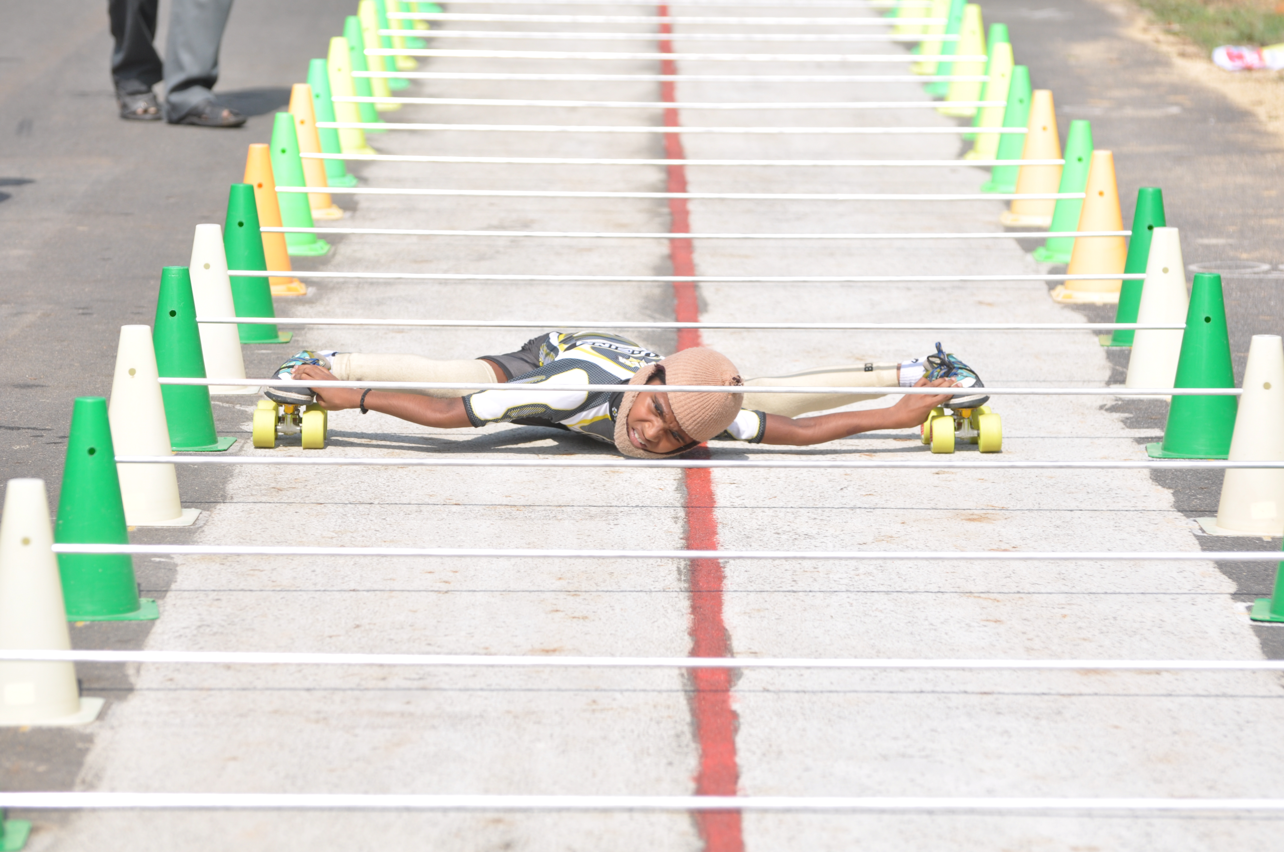 BACKWARD LIMBO SKATING | India Book of Records